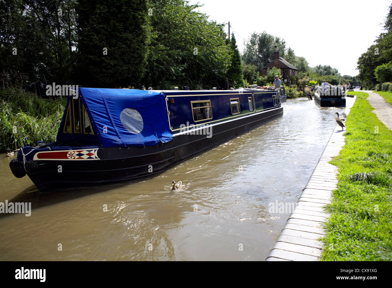 Colourful narrowboat using Glascote Locks on the Coventry Canal ...