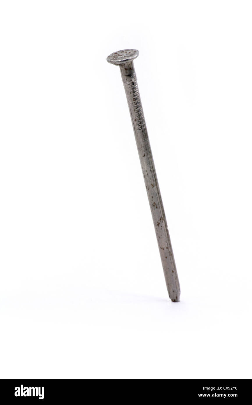 a iron nail with white background Stock Photo - Alamy