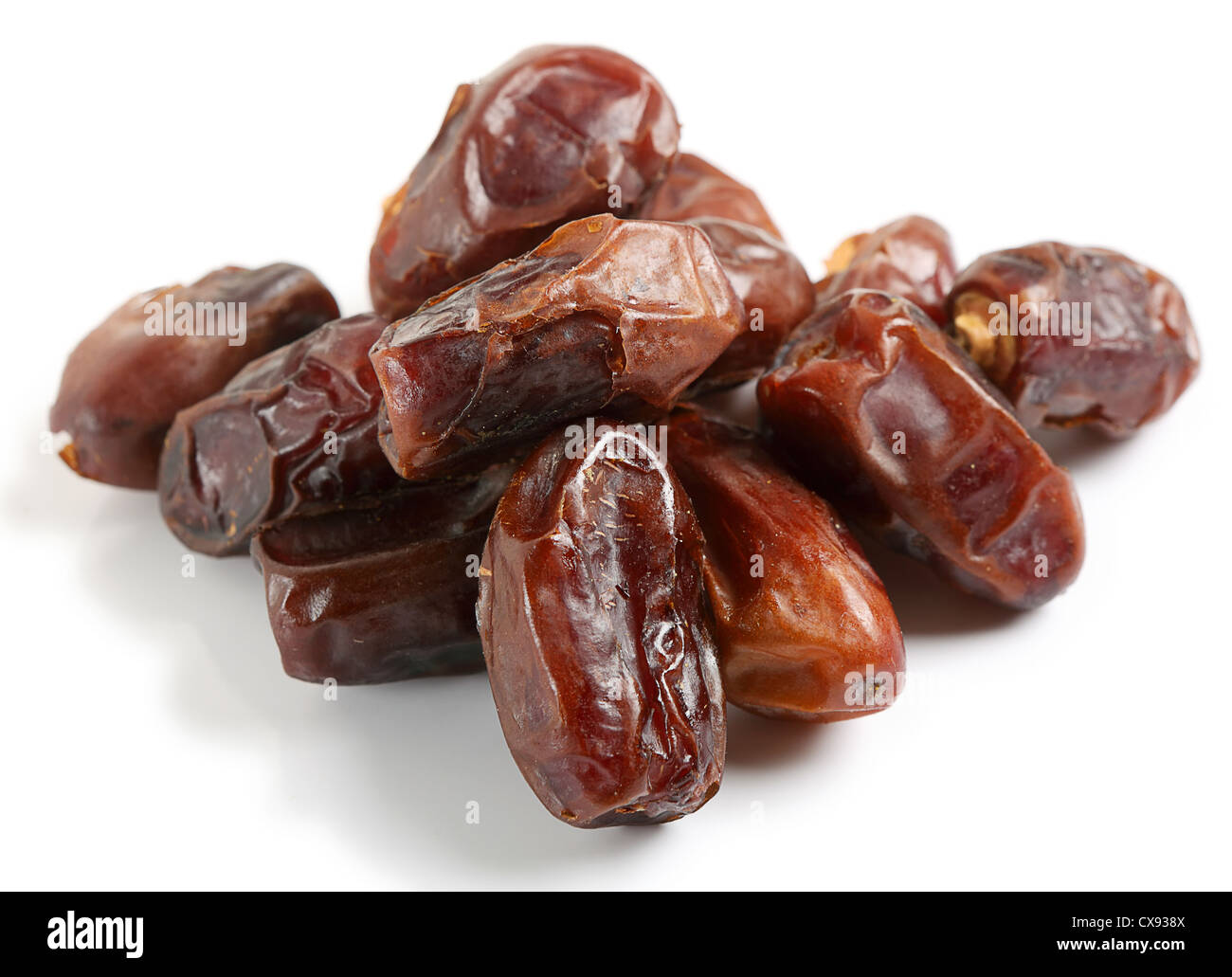 A heap of high-quality dates on a white background with a light shadow ...