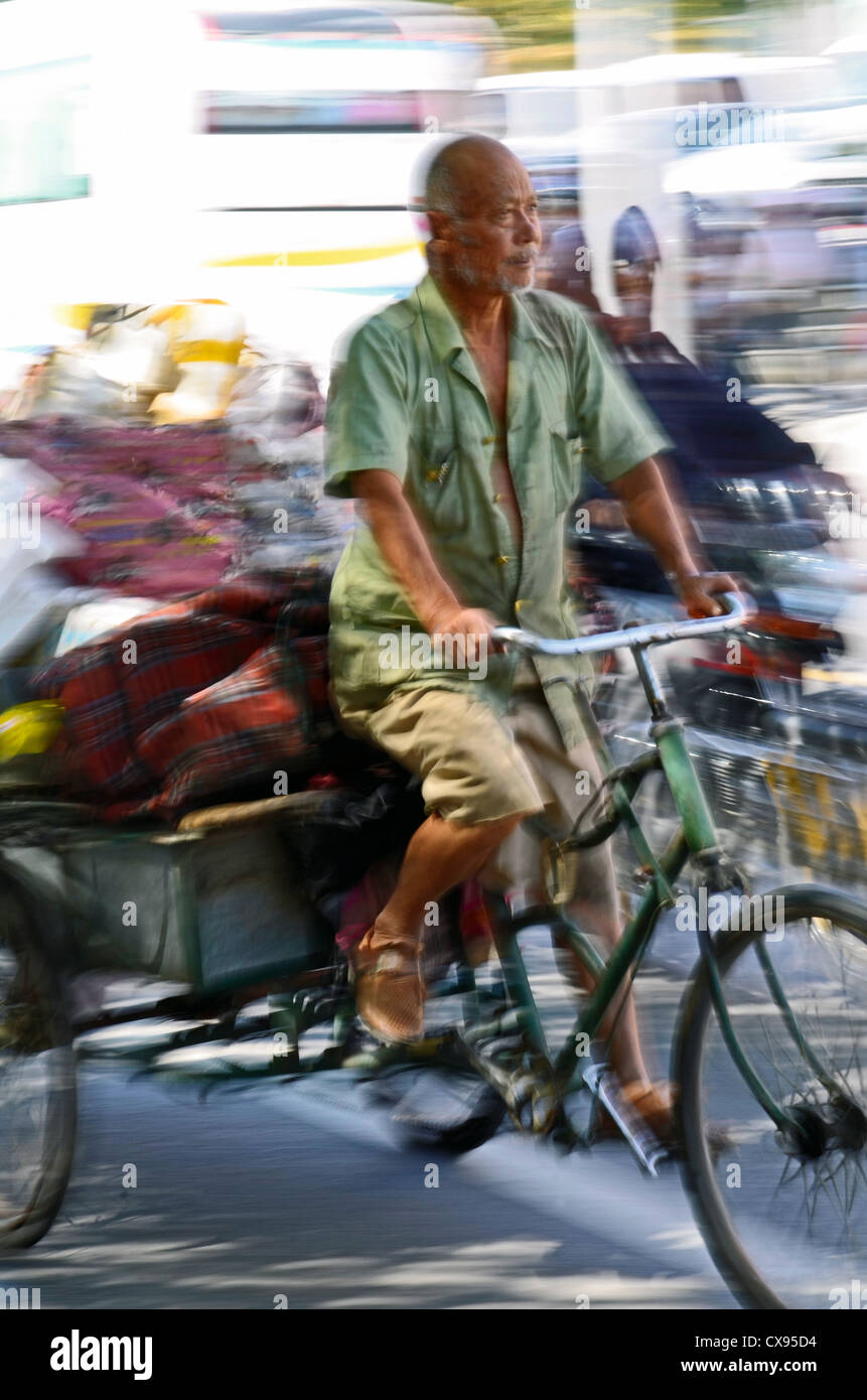 Rikshaw driver Xinjiang Altai City Aletai China Asia Stock Photo - Alamy