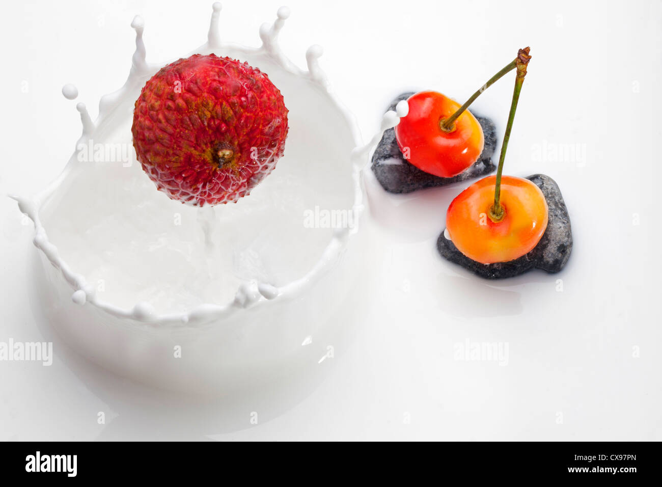 Milk splash fruit hi-res stock photography and images - Alamy
