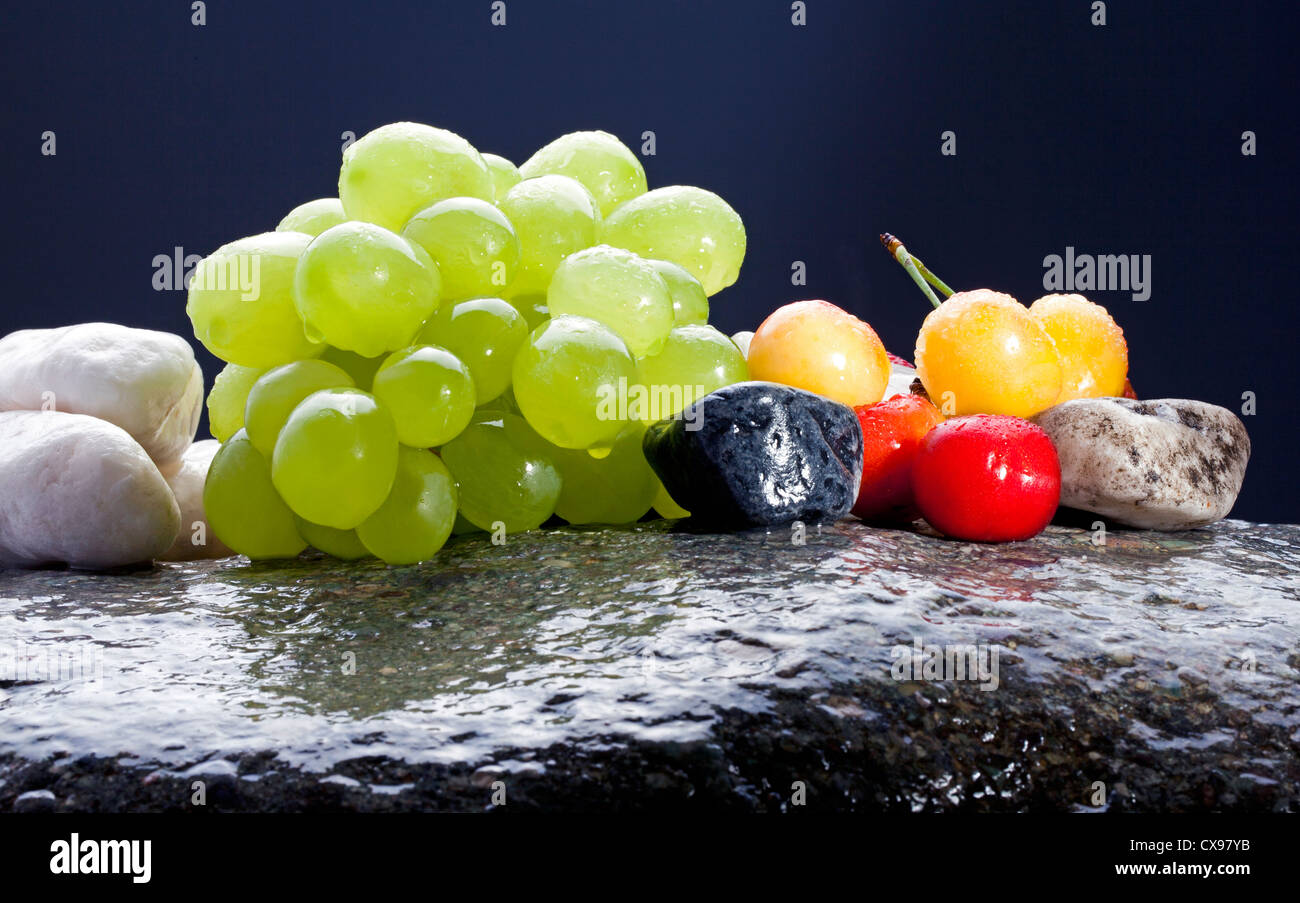 fruits on the rock Stock Photo - Alamy