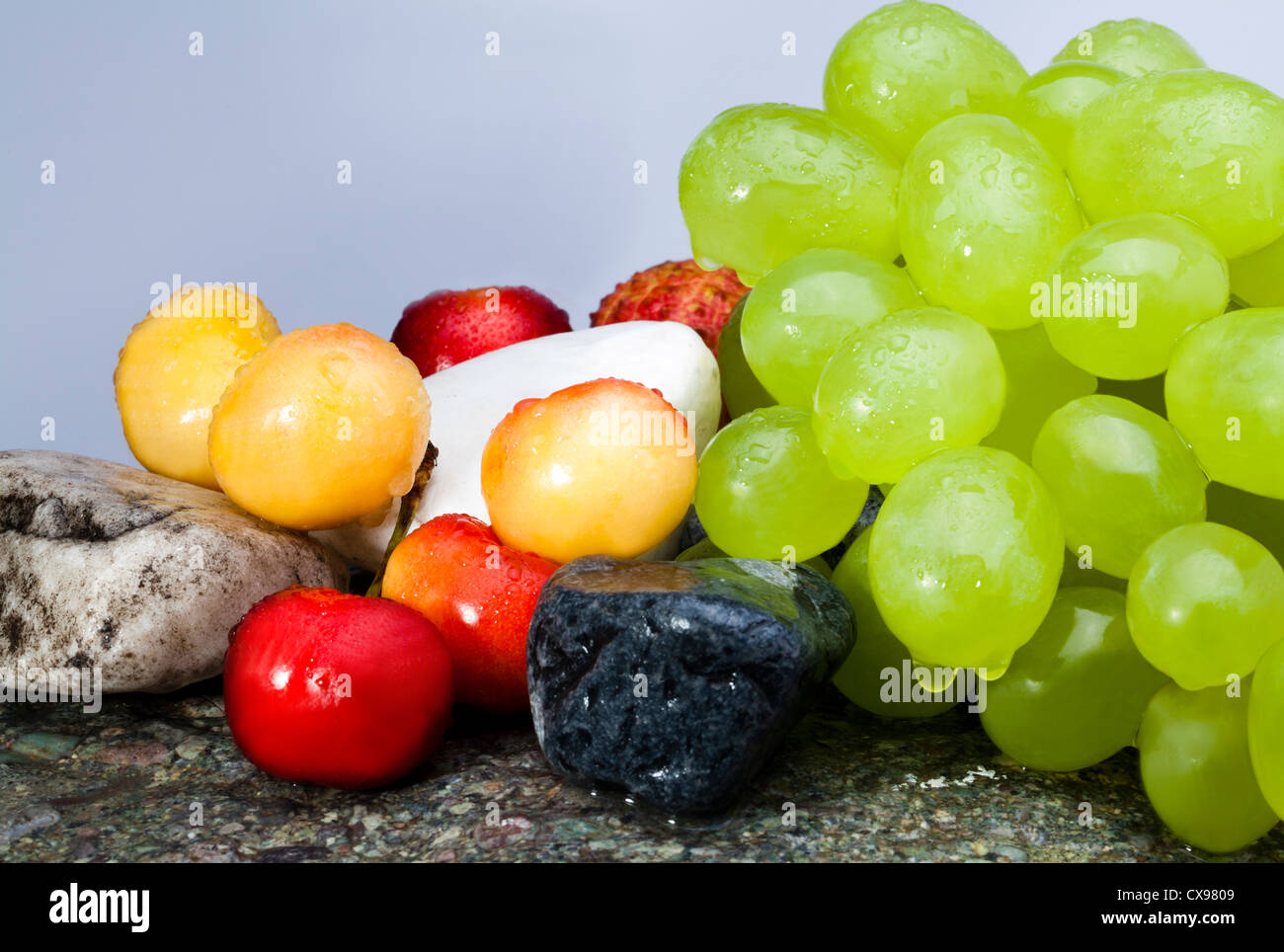 fruits on the rock Stock Photo - Alamy