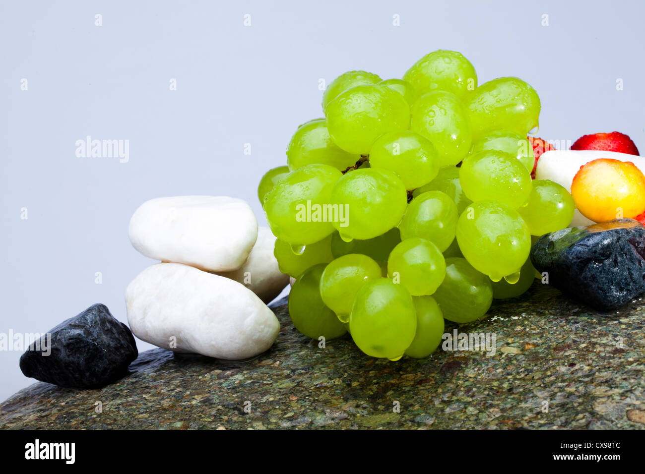 fruits on the rock Stock Photo - Alamy