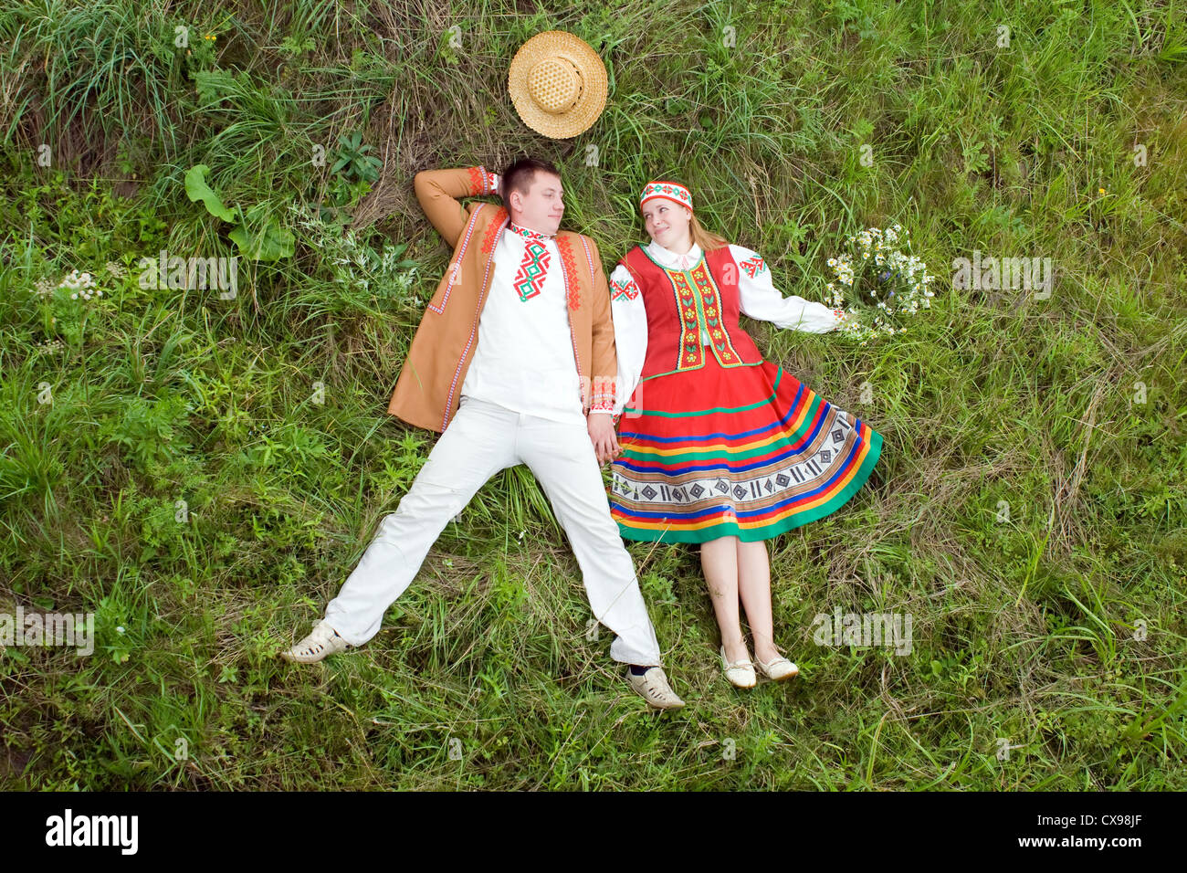 Young woman and man in national suits of the Belarus Stock Photo - Alamy