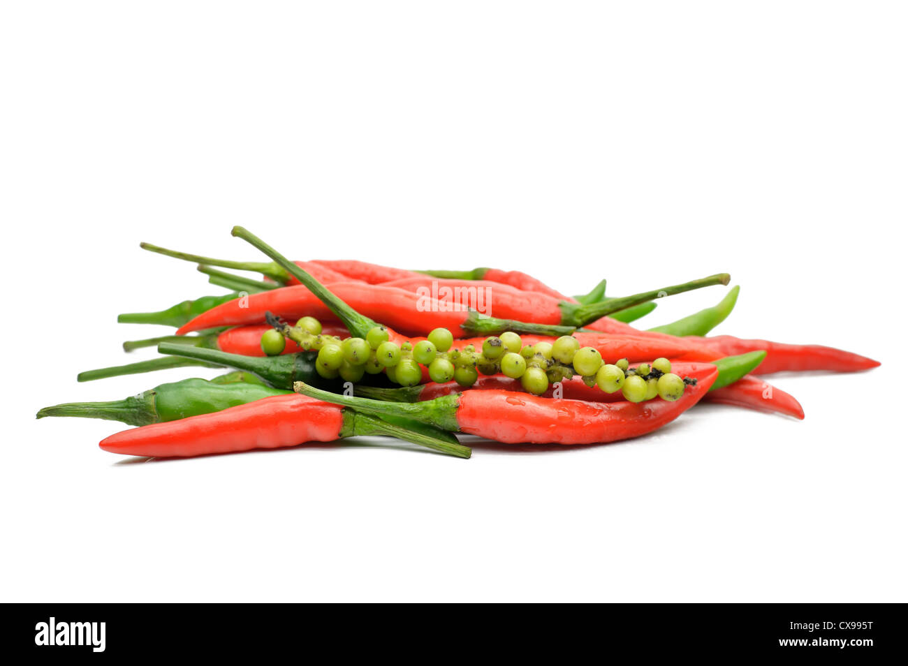 Multi-colored peppers on a white background, close-up Stock Photo - Alamy