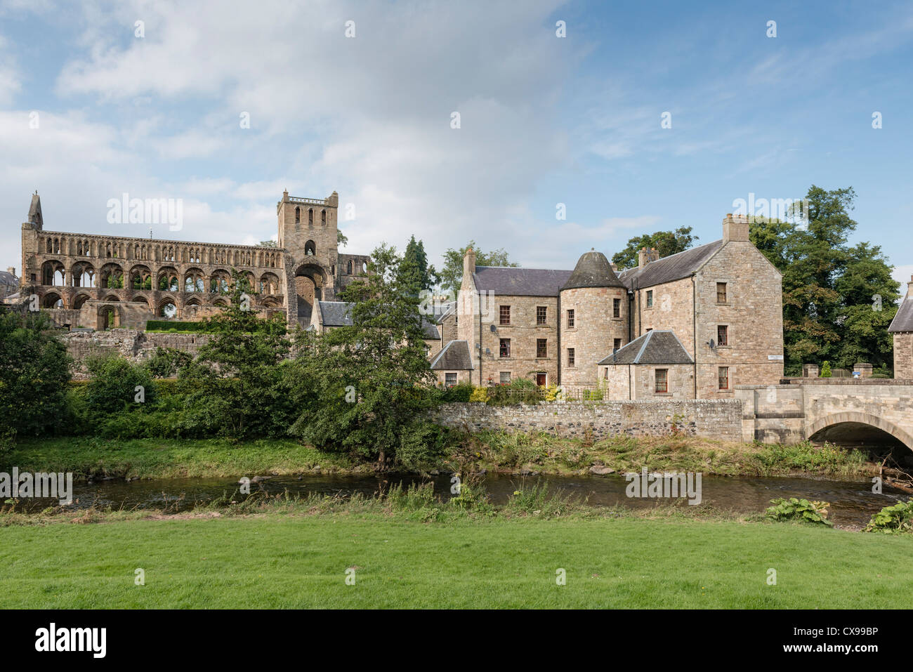 Jedburgh Abbey standing alongside Jed Water, a tributary of the River ...