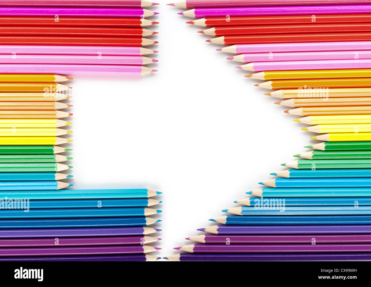 Arrow made from color pencils isolated on white Stock Photo - Alamy