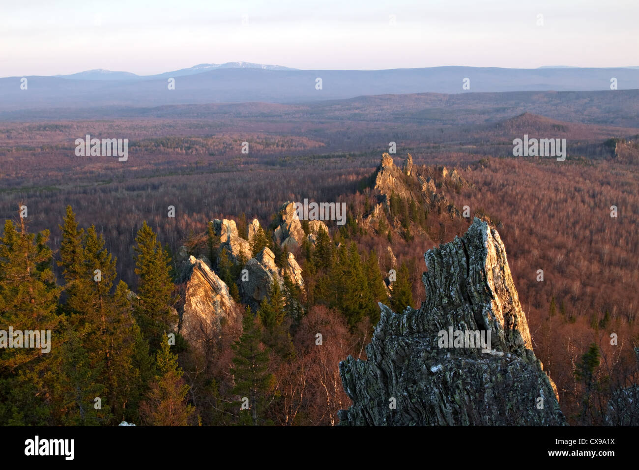 Sunset. Rocky outliers.The ridge Alabiya. Southern Ural mountains ...