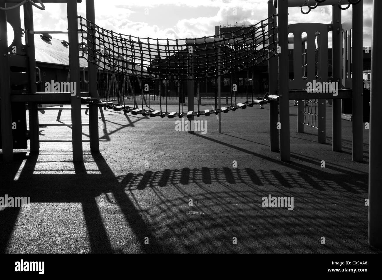 A black and white photo of a playground Stock Photo - Alamy