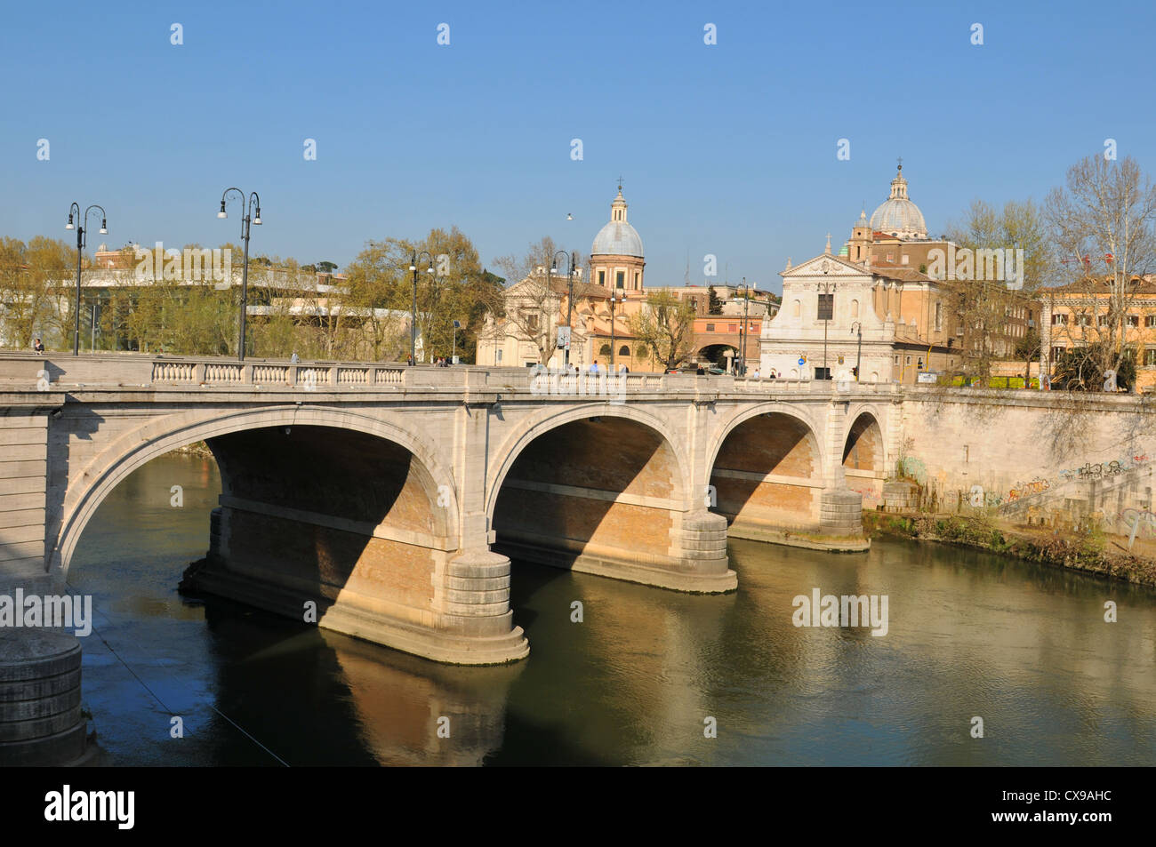 Historical buildings and bridge by the river Tibre in Prati district of ...