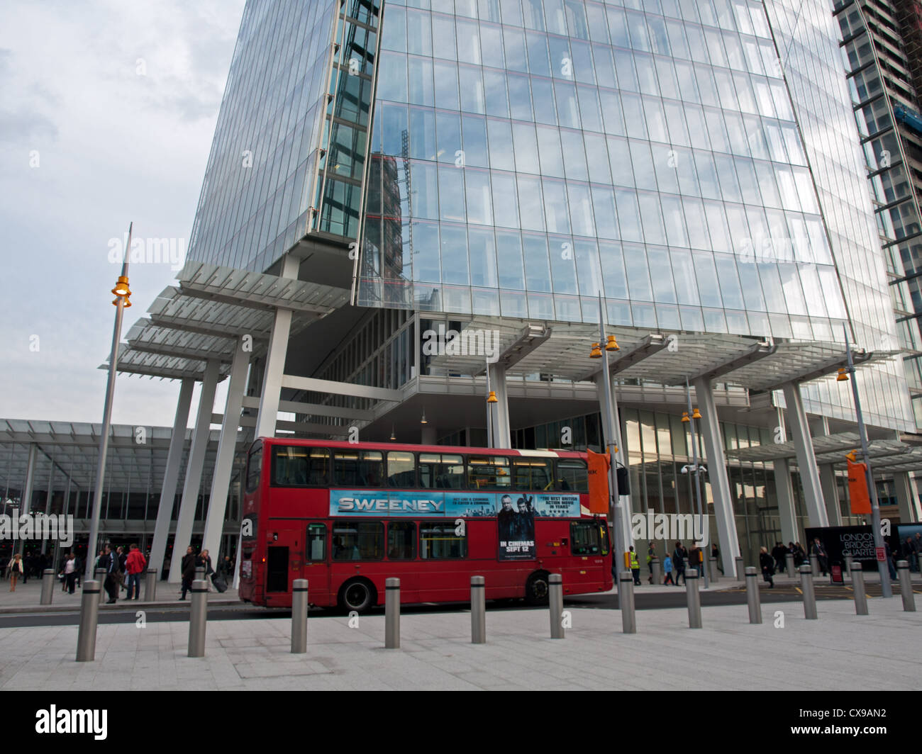 London bus at the base of The Shard, tallest building in the European ...