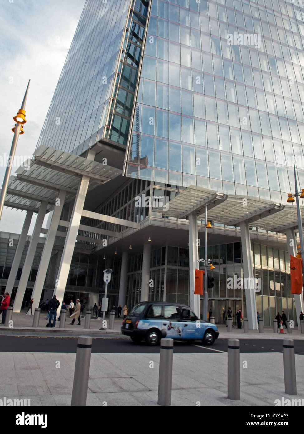 London taxi at the base of The Shard, tallest building in the European ...