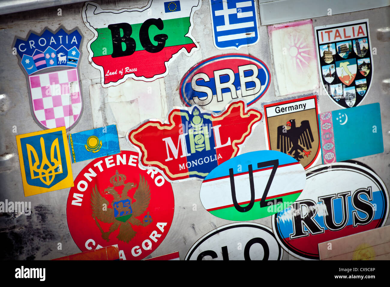 Country abbreviations stickers on a metal suitcase Stock Photo - Alamy