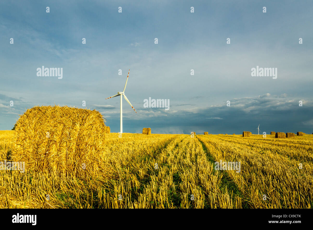 Windmills at harvest time Stock Photo - Alamy