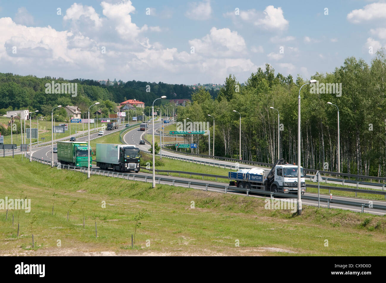 Lorries on motorway in Poland. Road E77 Krakow to Zakopane, looking ...