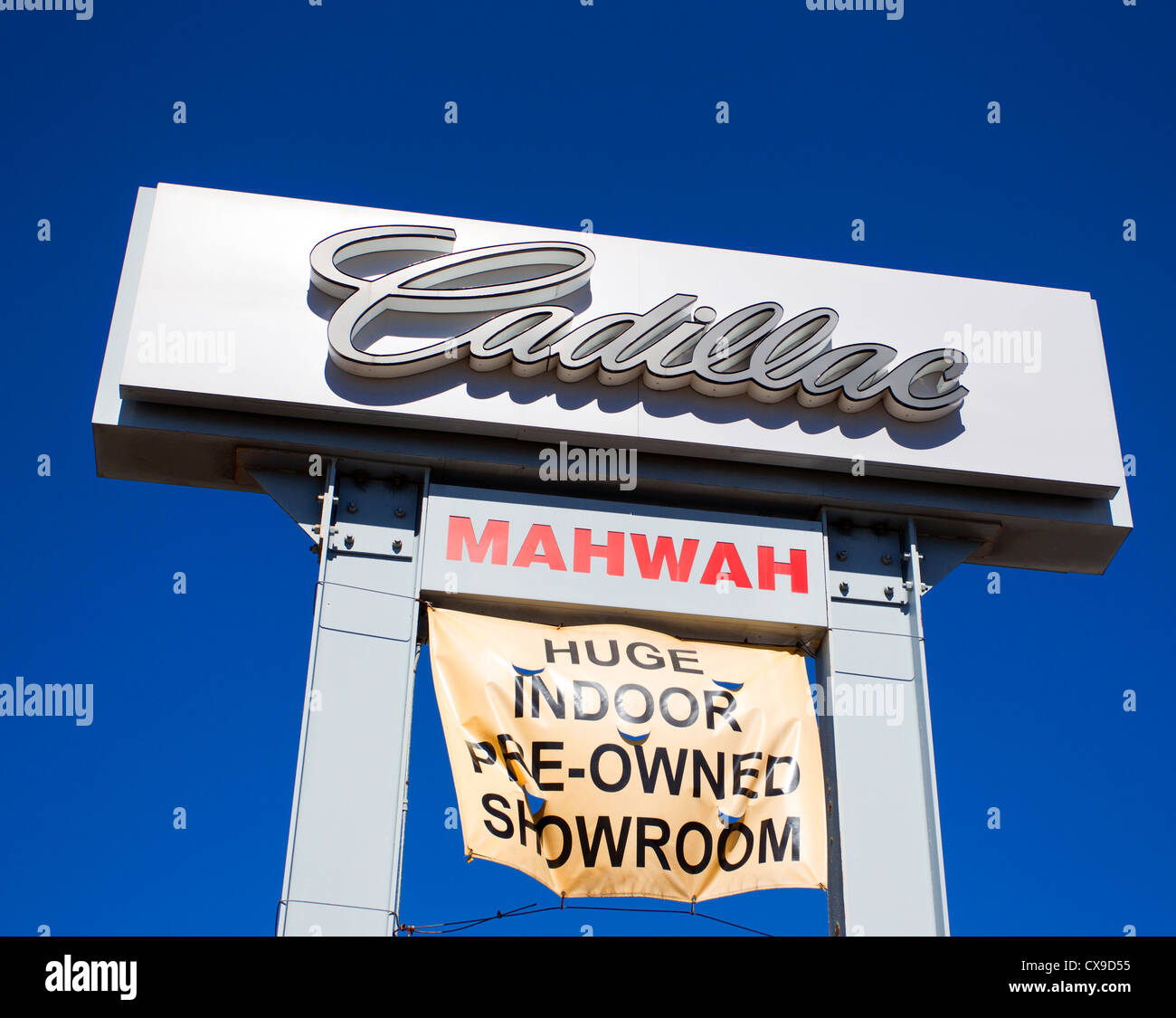 A sign above a Cadillac dealership Stock Photo - Alamy