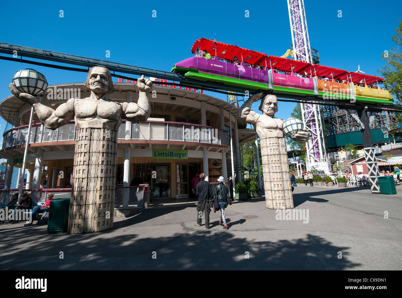The Lantern Carriers holding up monorail at Linnanmäki Amusement Park ...