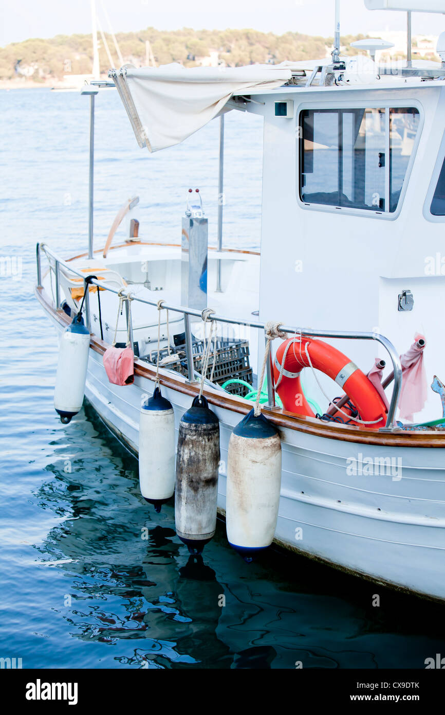 fishing boat in summer outside in sea at harbour background Stock Photo ...