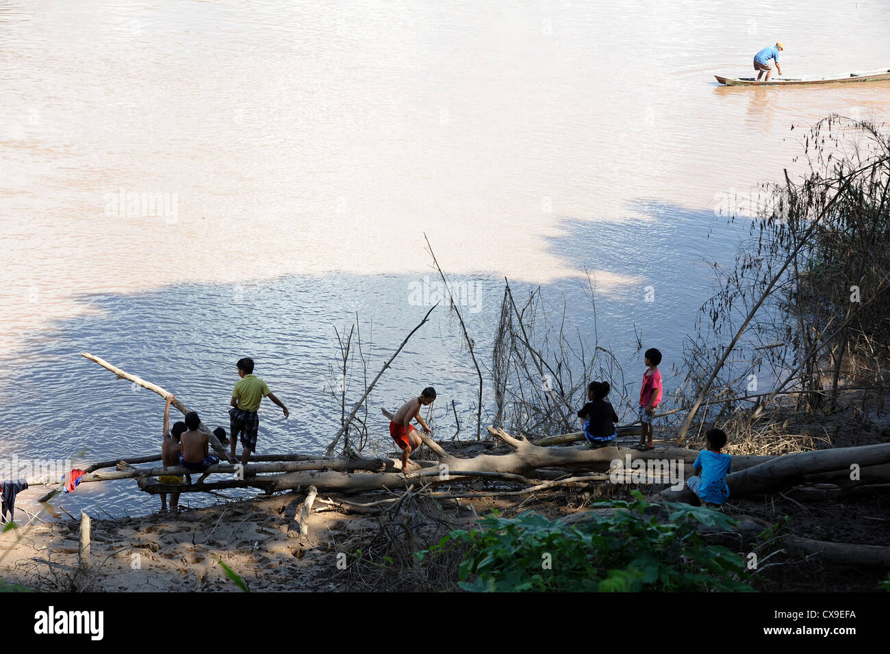 Children playing on banks river hi-res stock photography and images - Alamy