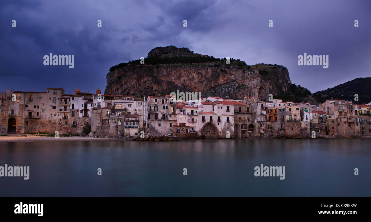 Cefalu old town with mountain behind hi-res stock photography and ...