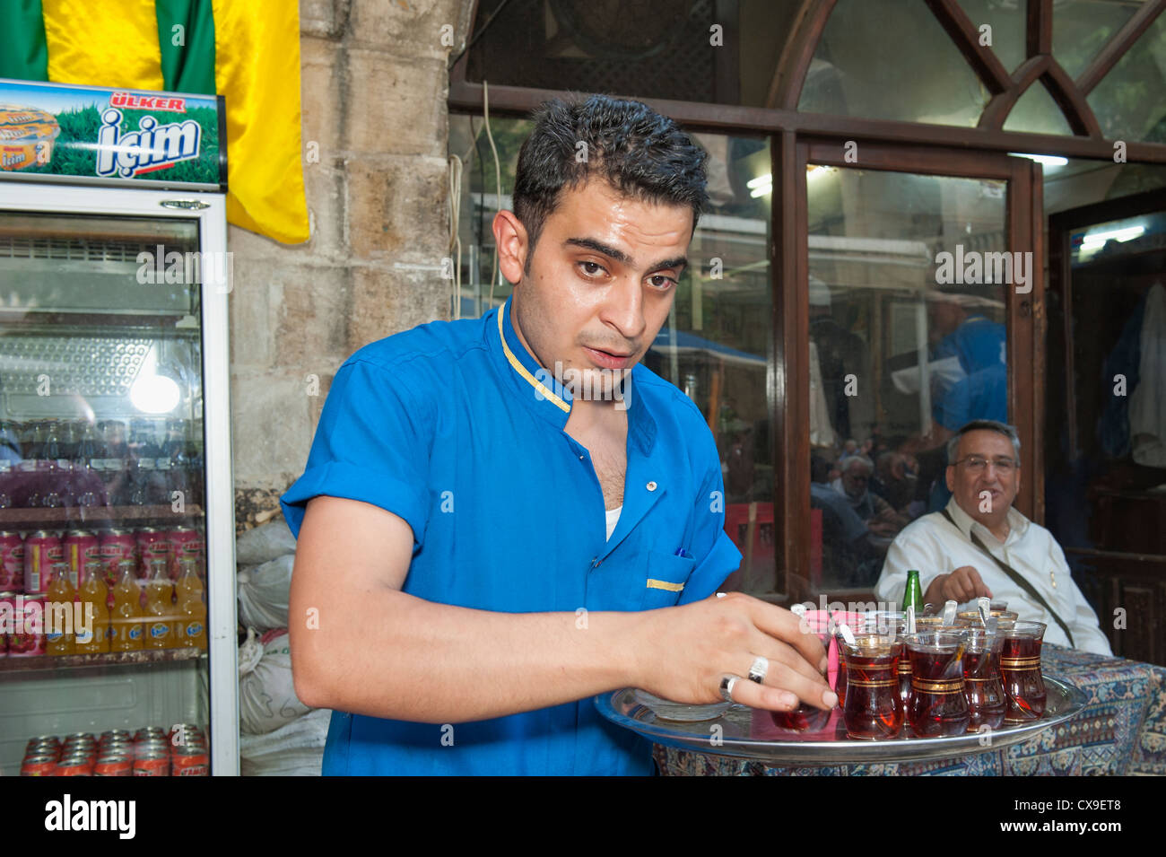 Waiter delivering tea, Urfa, Eastern Turkey Stock Photo - Alamy