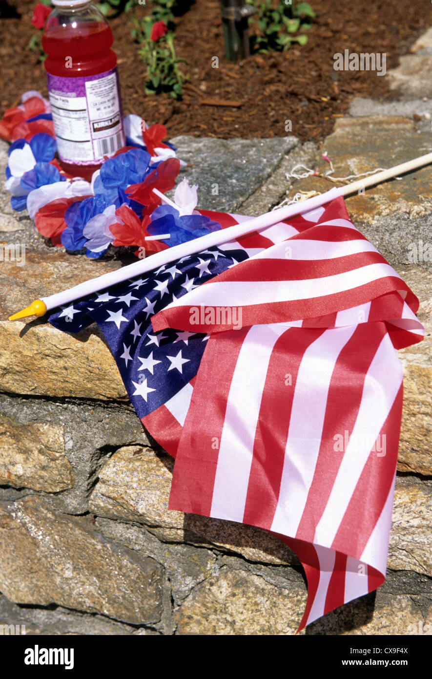 Unpatriotic. American flag lying on the ground after a parade. Street ...