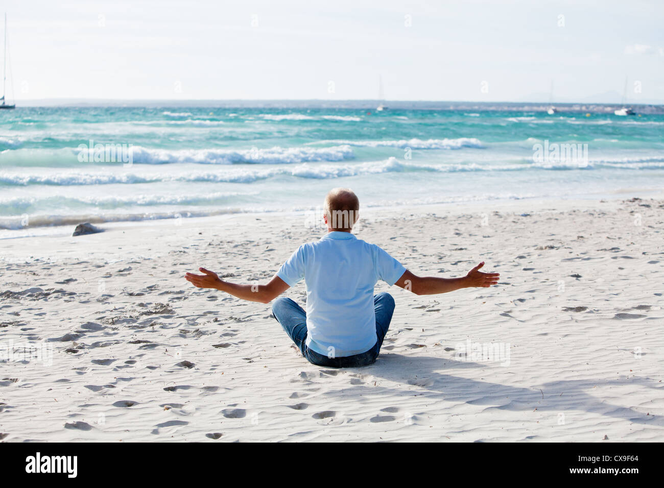 young man is relaxing on beach in summer vacation freedom Stock Photo ...