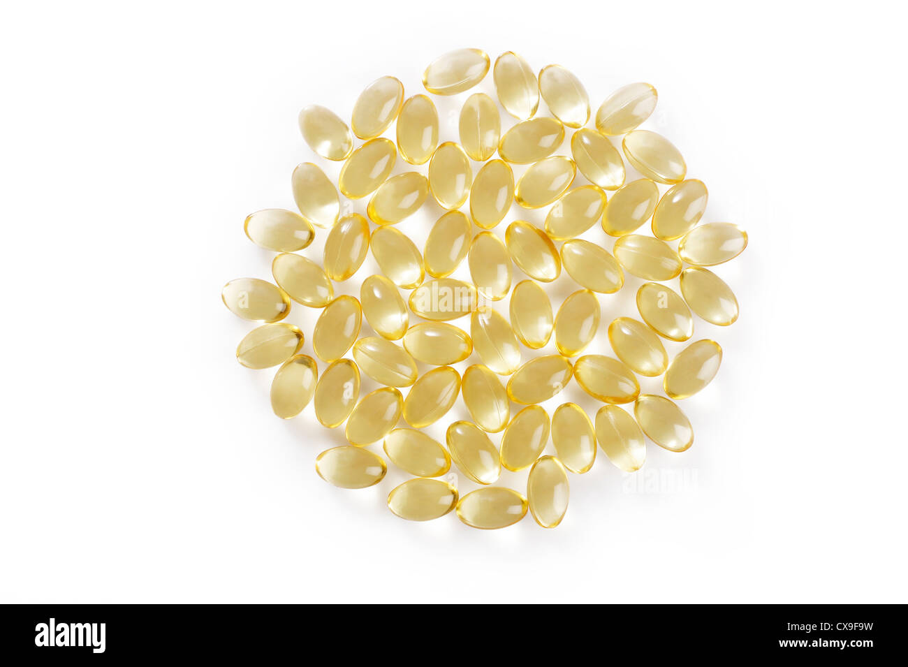 cod liver fish oil capsule on white background Stock Photo - Alamy