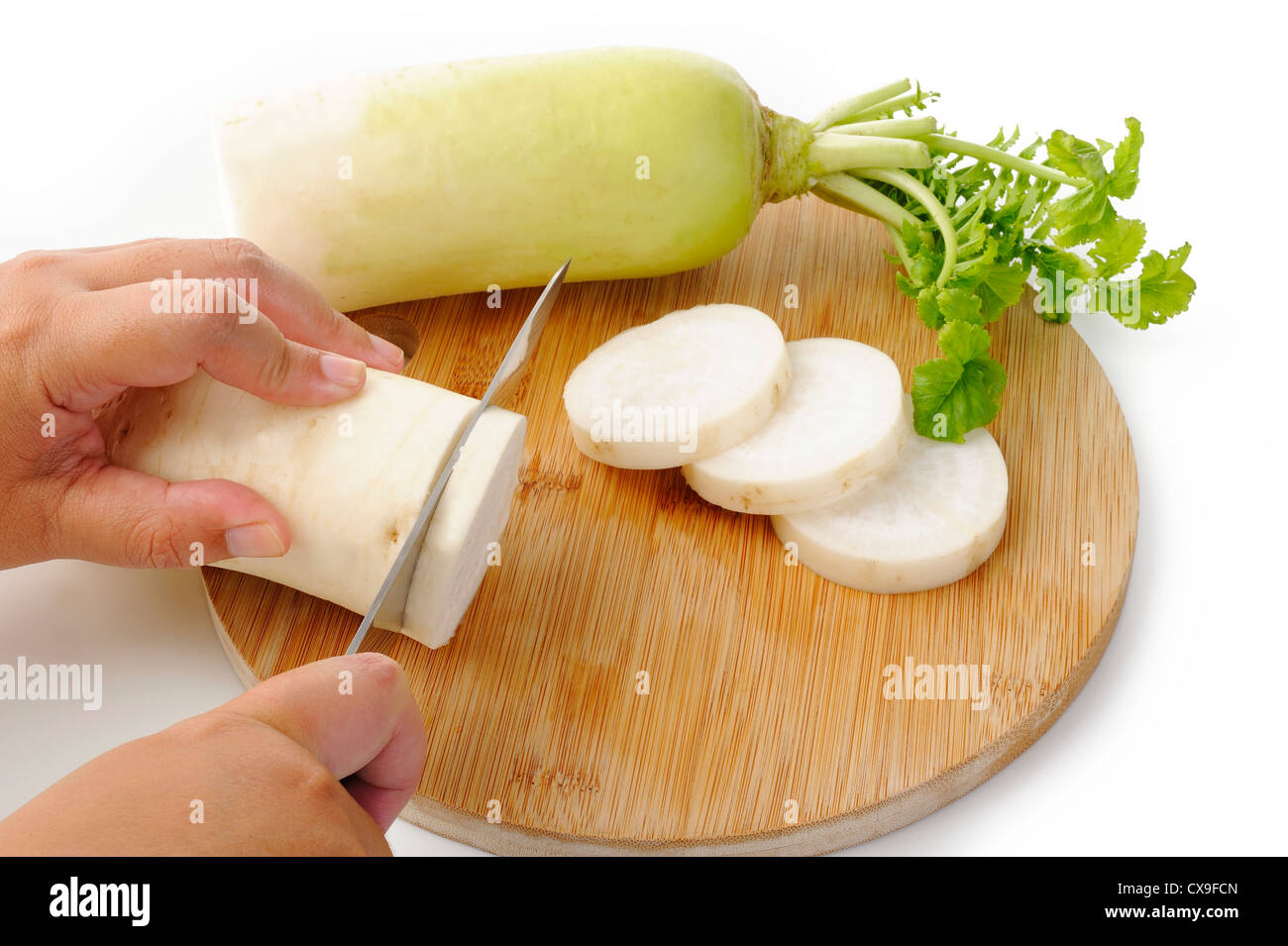 slice daikon radish on wood Stock Photo - Alamy