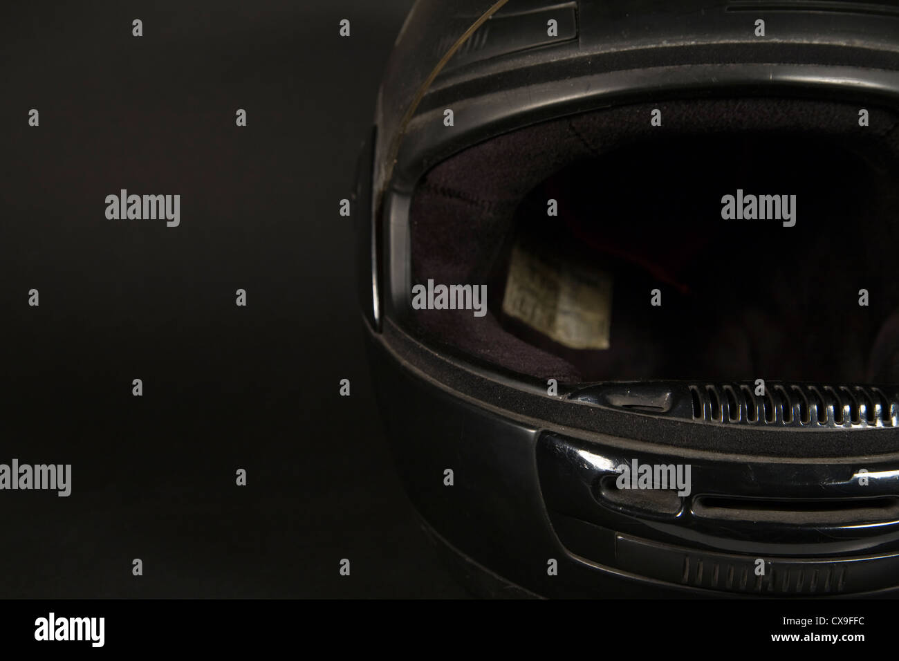 front view of a Black Crash Helmet Stock Photo - Alamy