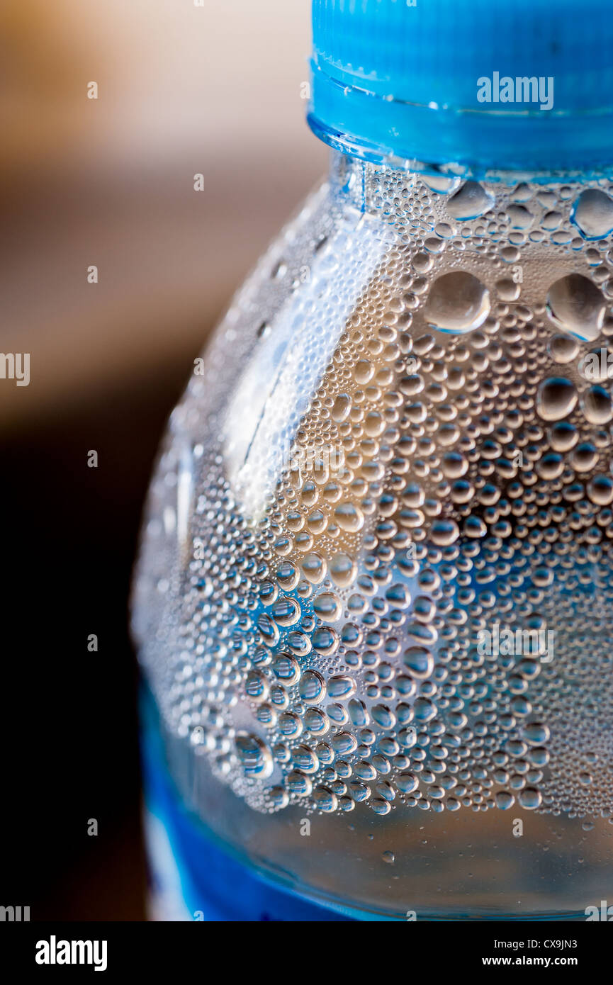 Drop of water on drinking water bottle Stock Photo - Alamy