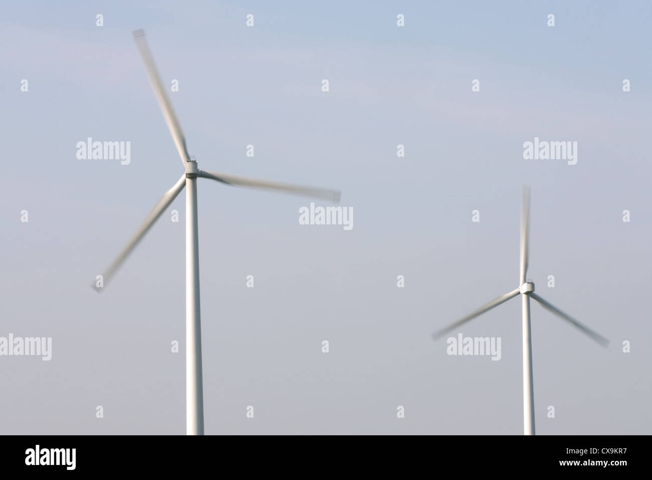 Rotating wind wheels on a hill Stock Photo - Alamy