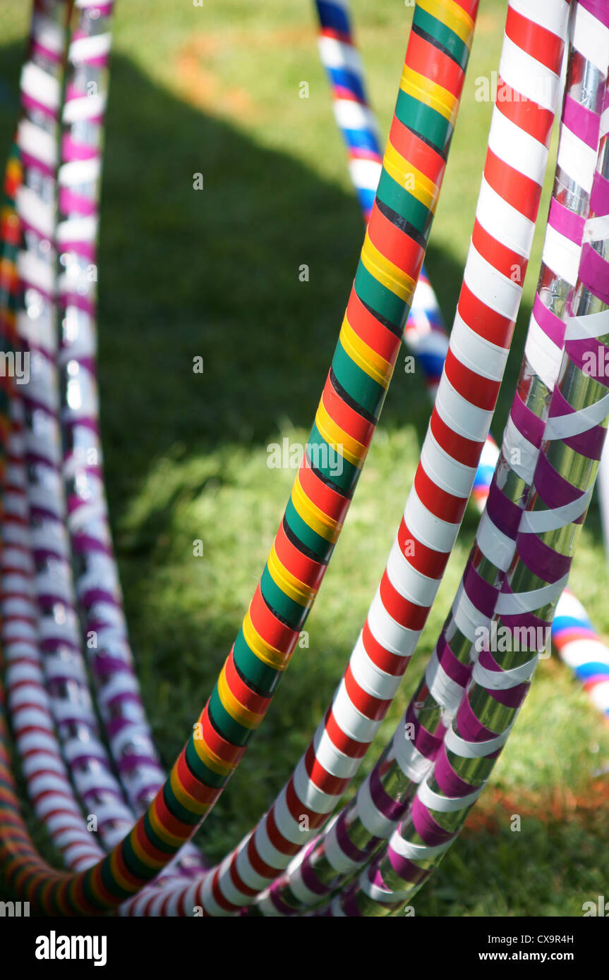 colorful hula hoola hoops hoop graphic toy twirled waist limbs neck ...