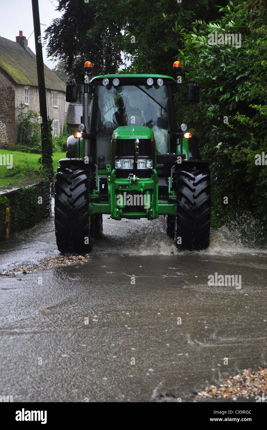 Tractor in flood water hi-res stock photography and images - Alamy