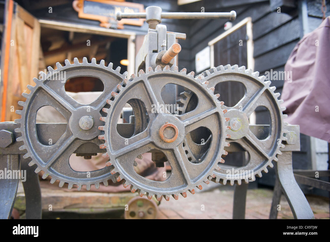 Old wrought iron wheels from machine Stock Photo - Alamy
