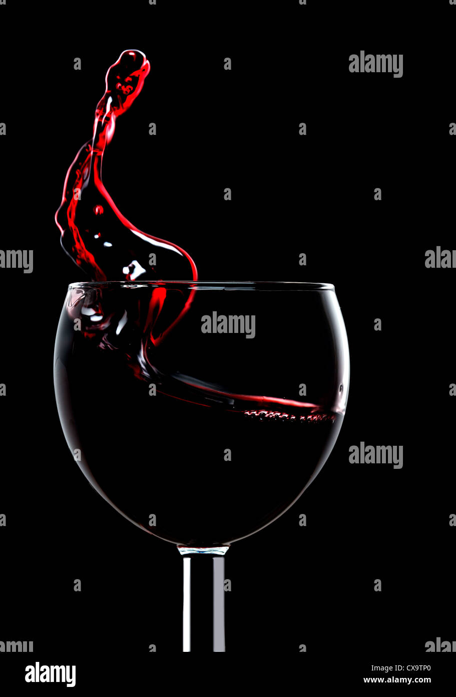Red splash on black hi-res stock photography and images - Alamy