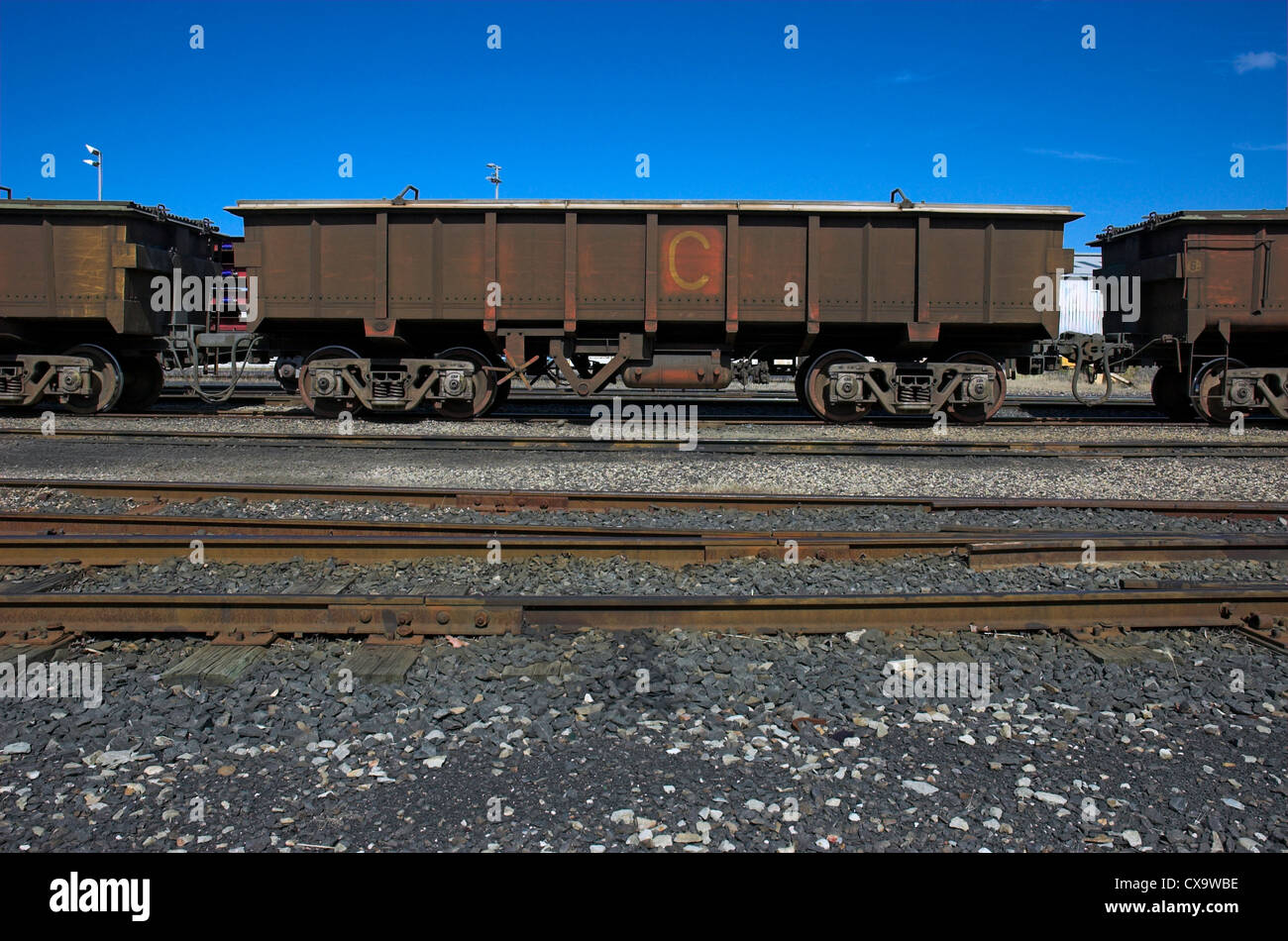Railway freight train and wagons Stock Photo - Alamy