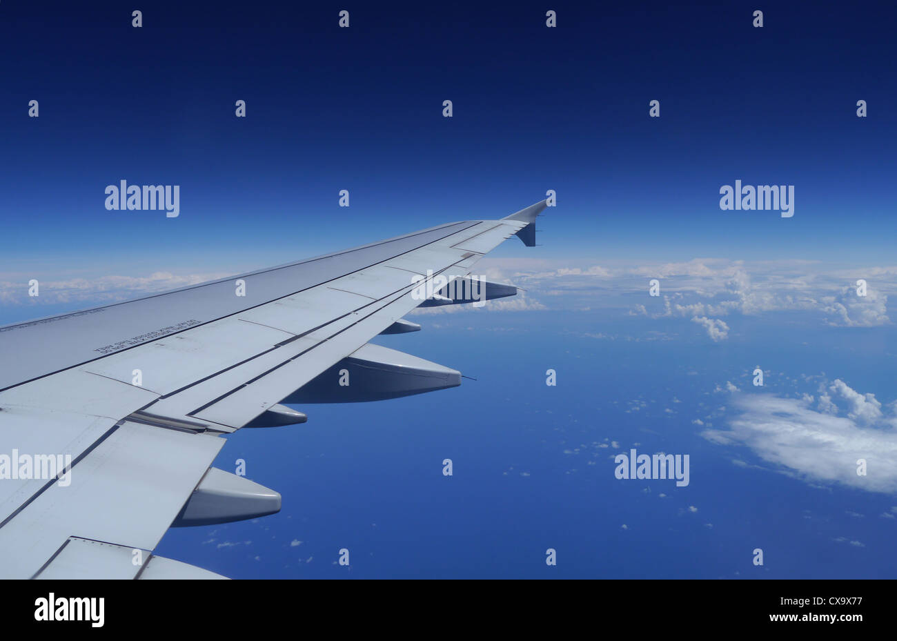 airplane wing in flight Stock Photo - Alamy