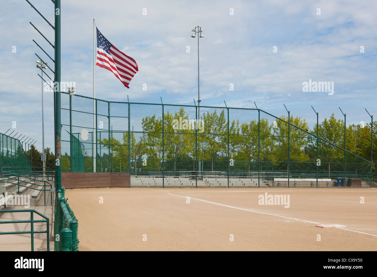 First base line on a baseball pitch. View from the fence of the sports ...