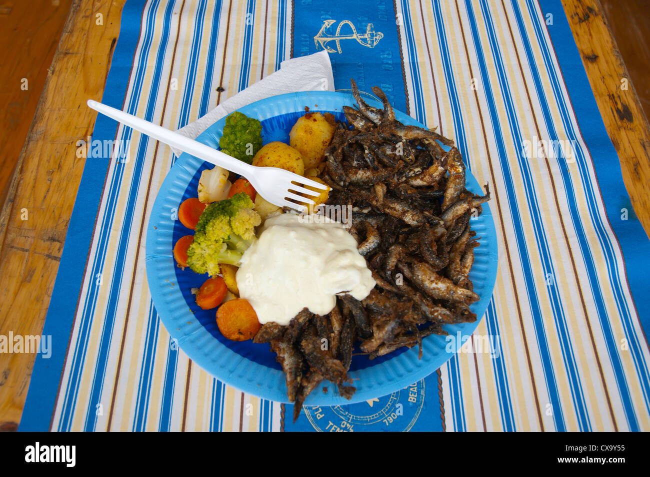 Fried vendace fish with garlic sauce and fried whole potatoes at ...
