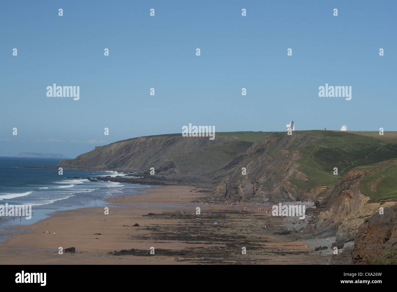Bude beaches at Northcott bay and with people walking, paddling and ...