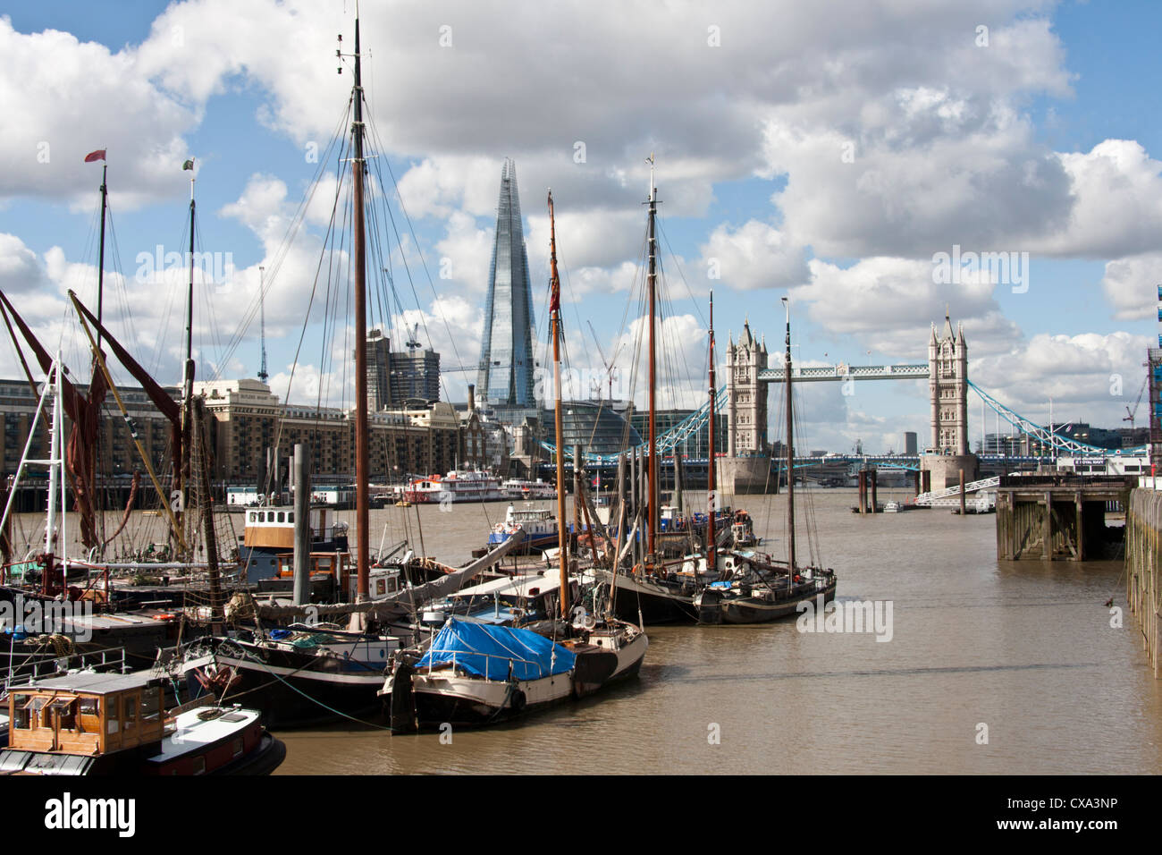 Thames barges moored near Tower Bridge, London Stock Photo - Alamy