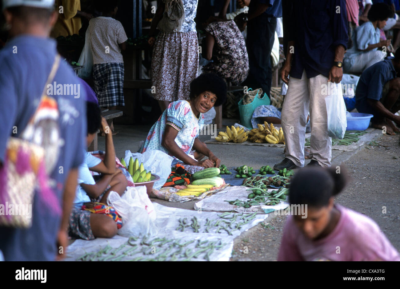 Papua New Guinea, Alotau, scene at the local market in the early ...