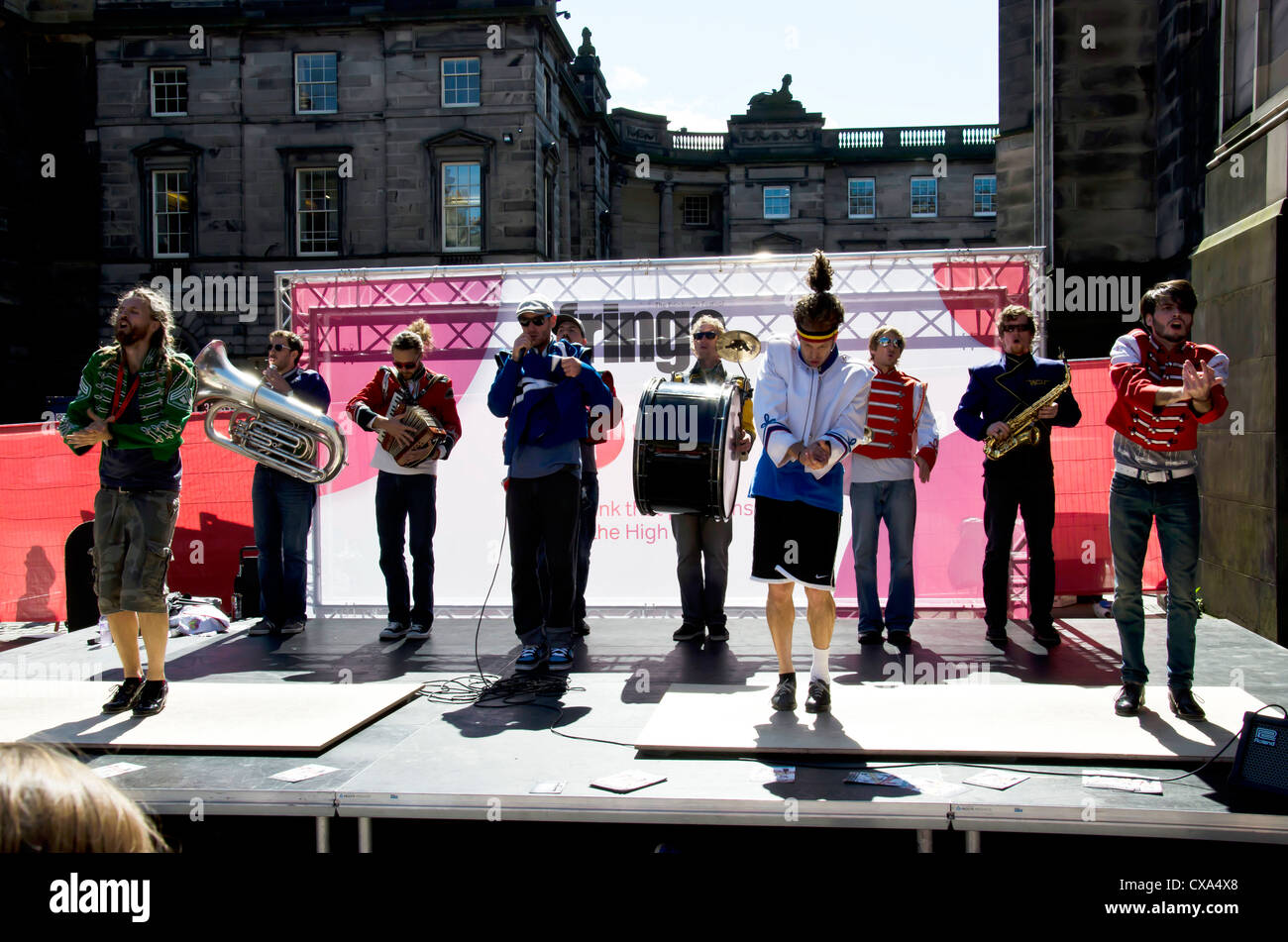 Members of a musical group performing a part of their Edinburgh ...