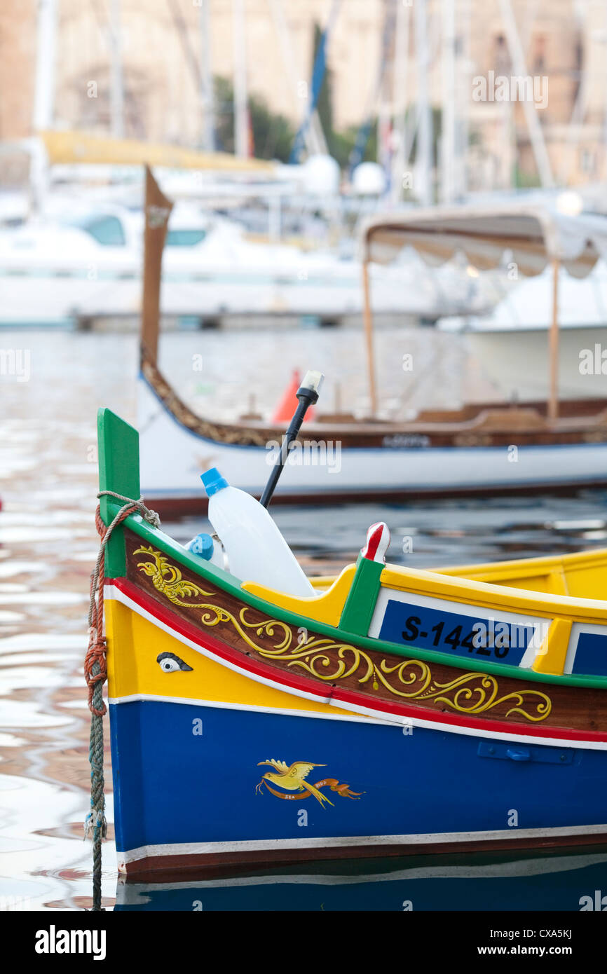 Colourful traditional luzzu fishing boats Marsaxlokk harbour Malta ...