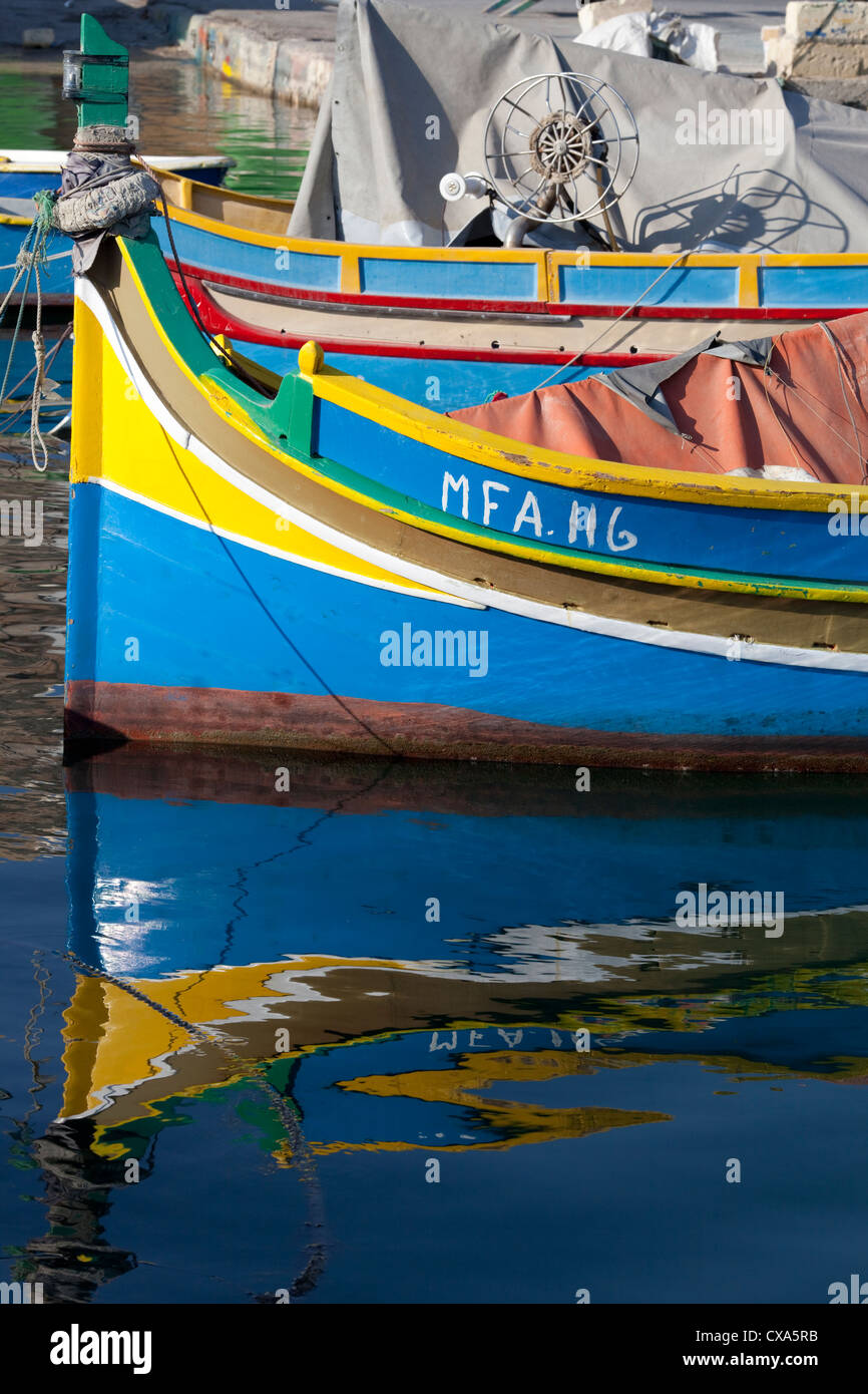 Colourful traditional luzzu fishing boats Marsaxlokk harbour Malta ...