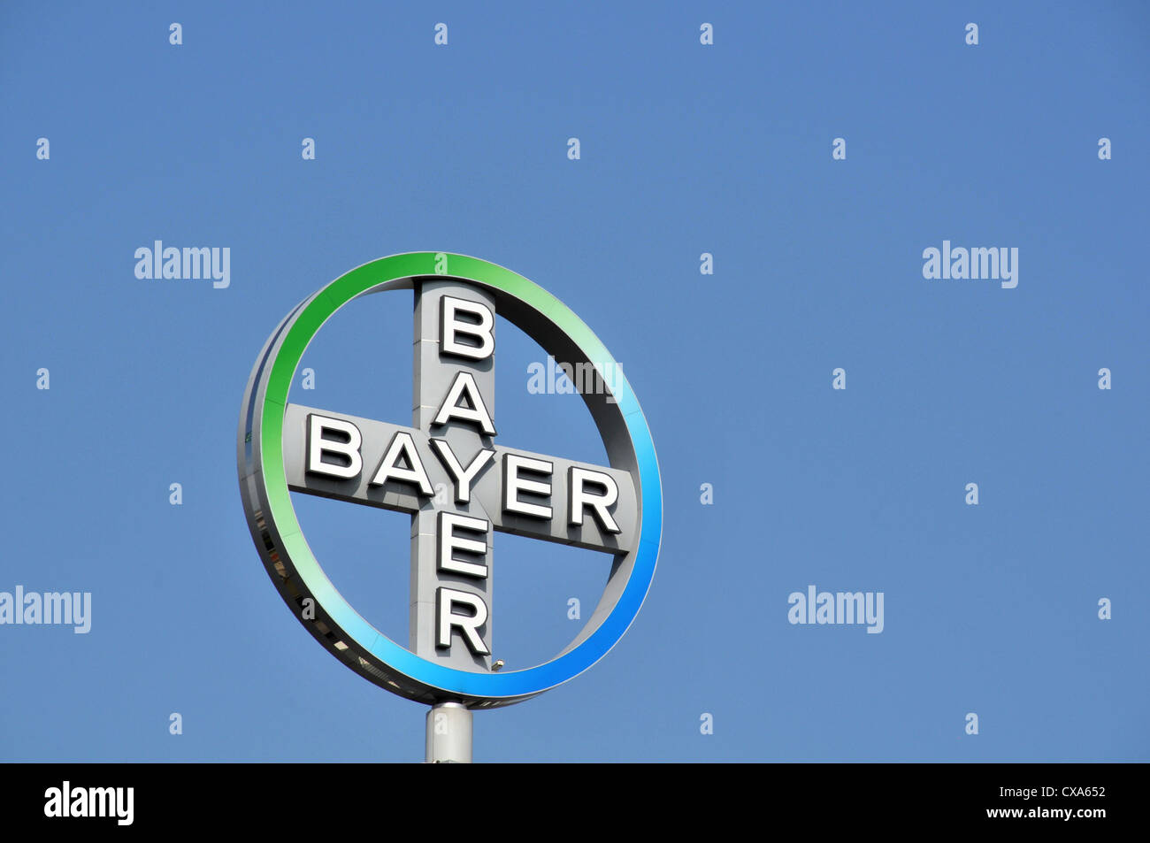 Bayer cross logo on top of a tower Berlin Germany Stock Photo - Alamy