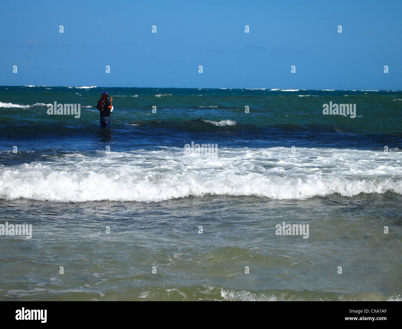 A fisherman in a sea Stock Photo - Alamy
