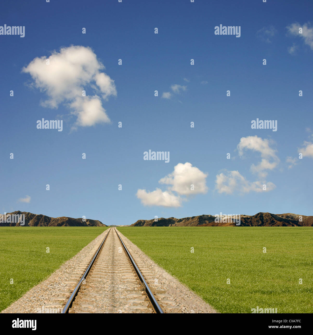 A Landscape with Railway Line and Mountains Stock Photo - Alamy